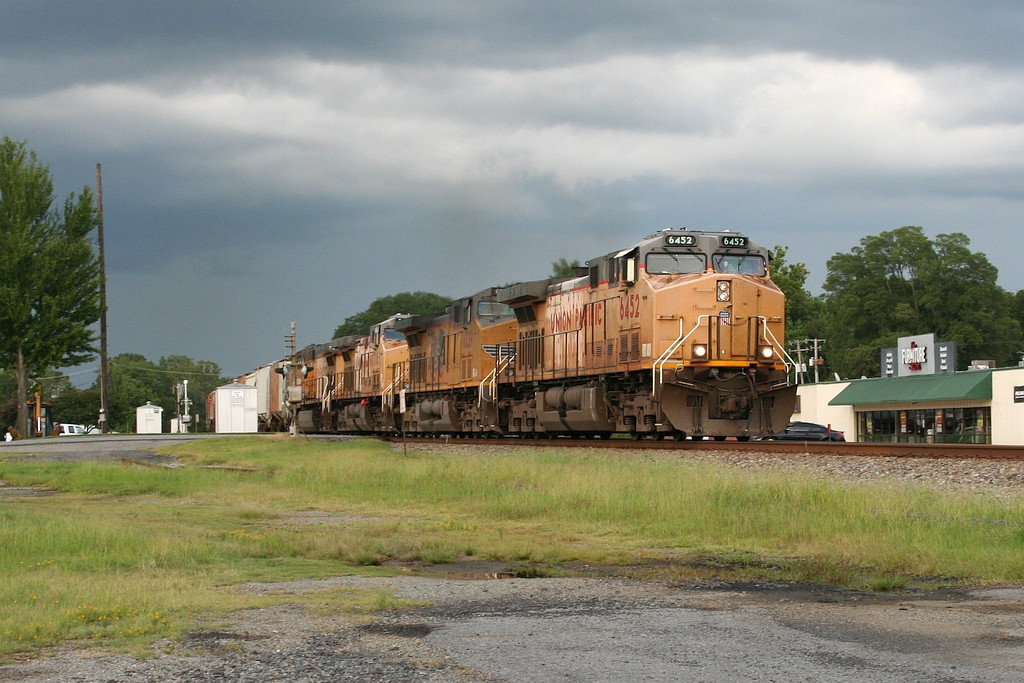 UP SB freight running away from a massive storm